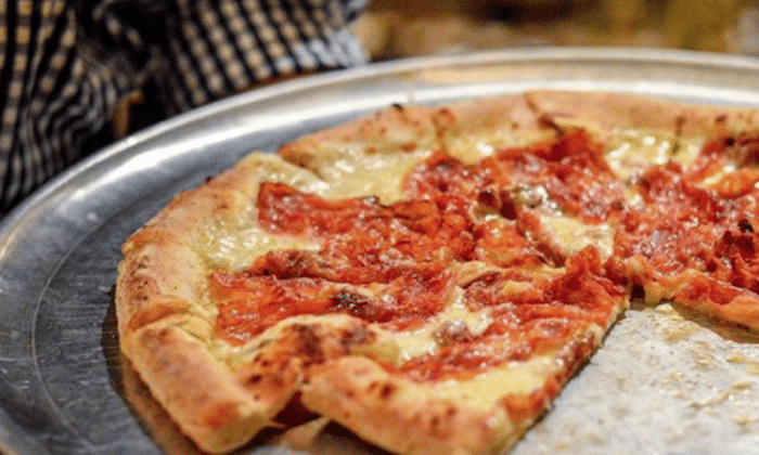 This Pizzeria Will Bring Unlimited Pizza to Your Table and Can Only Be ...