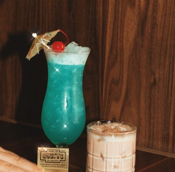 New Retro Dive Bar in Austin Brings Jukebox Music and Classic Cars